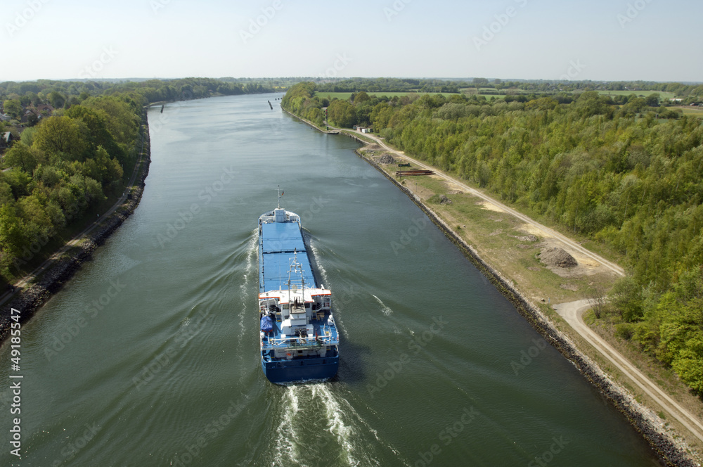 Frachtschiff auf dem Nord-Ostsee-Kanal bei Kiel Stock Photo | Adobe Stock