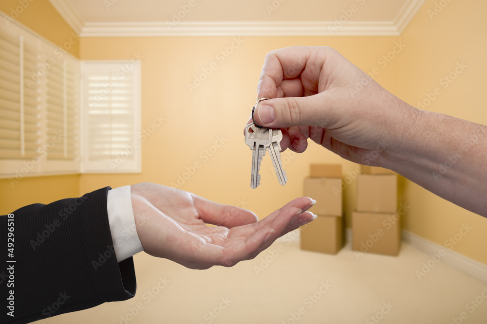 Handing Over the House Keys Inside Empty Room Stock Photo | Adobe Stock