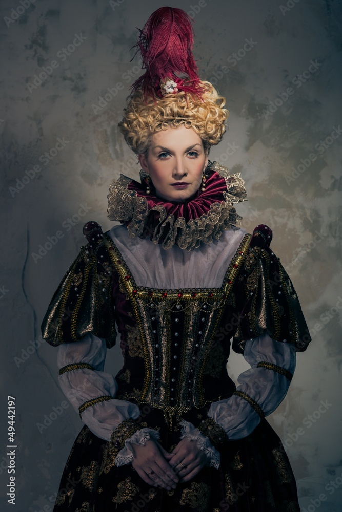 Haughty queen in royal dress Stock Photo | Adobe Stock