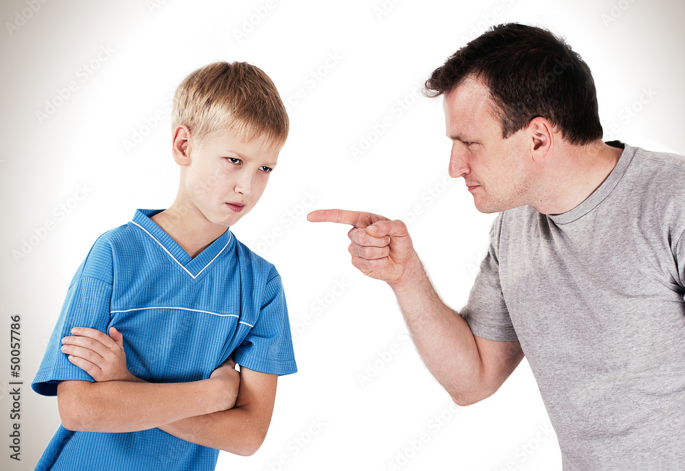 Father punishes his son. Isolated Stock Photo | Adobe Stock