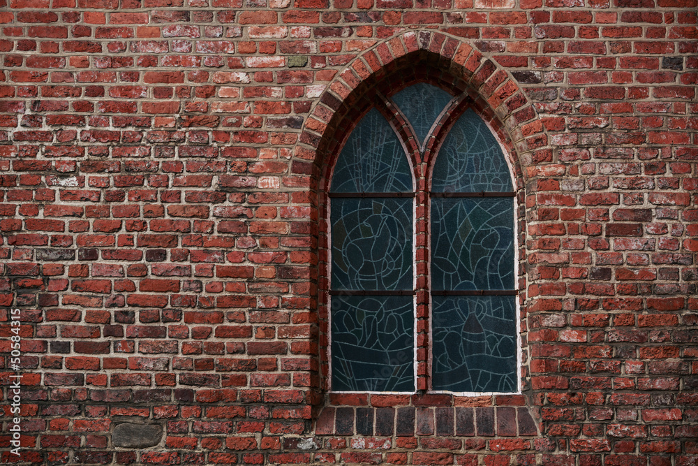 Gothic brick wall with a window,a stained glass window Stock Photo ...