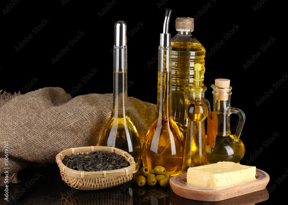 Different types of oil with sunflower seeds and olives Stock Photo ...
