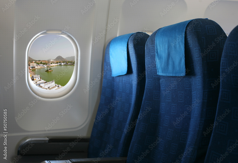 airplane seat and window Stock Photo | Adobe Stock