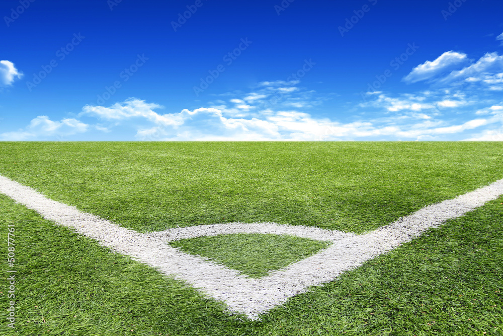 Football and soccer field grass stadium Blue sky background Stock Photo ...