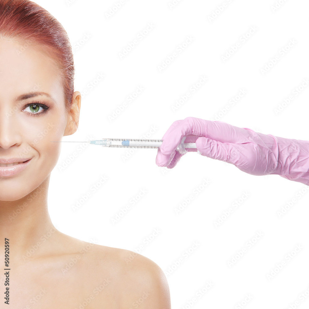 Beautiful woman gets an injection in her face isolated on white Stock ...