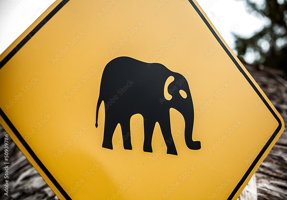 Road sign "caution elephants" on the track in Thailand Stock Photo ...