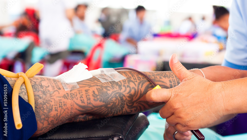 arm of a donor donating blood at hemotransfusion station Stock Photo ...
