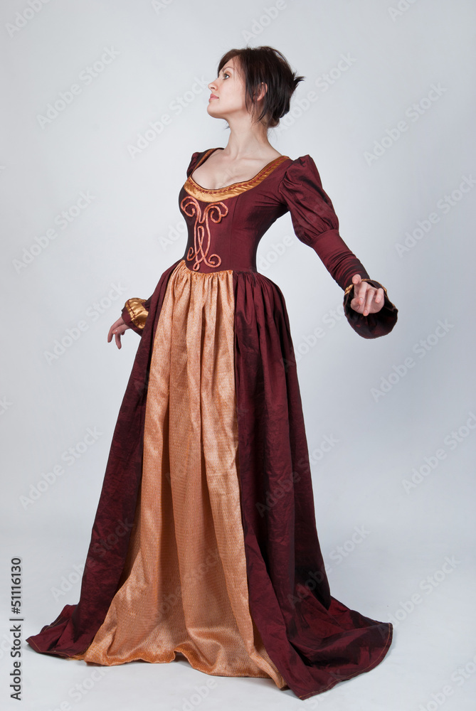 Beautiful woman in medieval dress Stock Photo | Adobe Stock