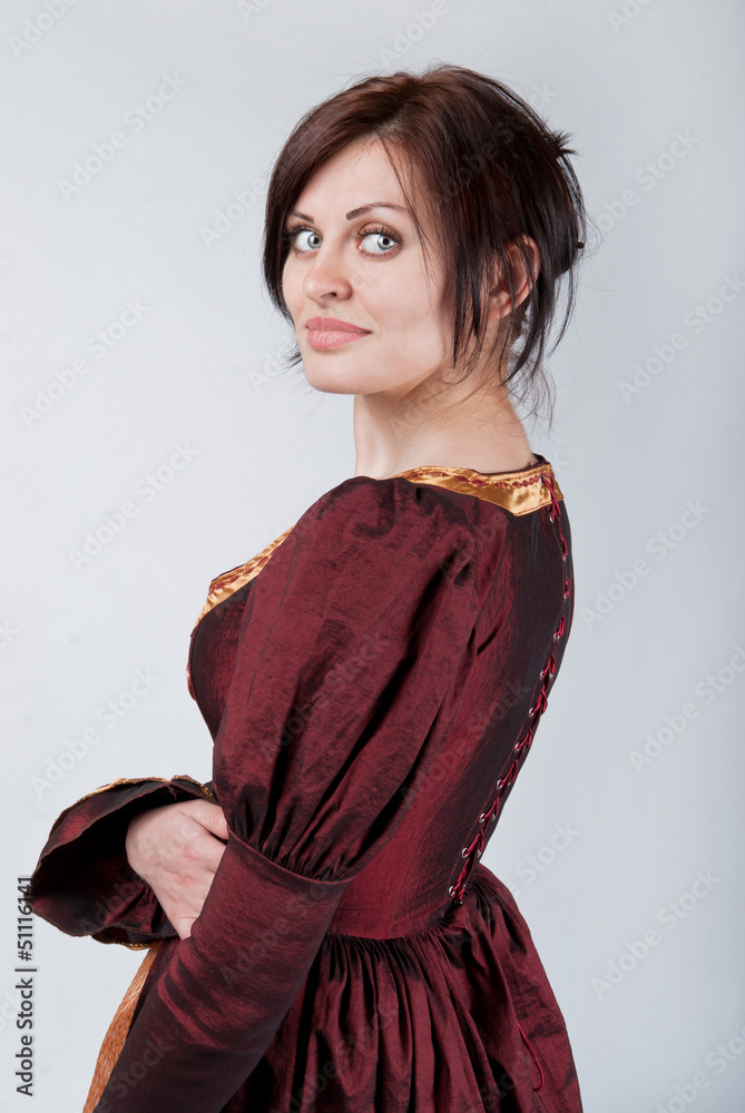 Beautiful woman in medieval dress Stock Photo | Adobe Stock