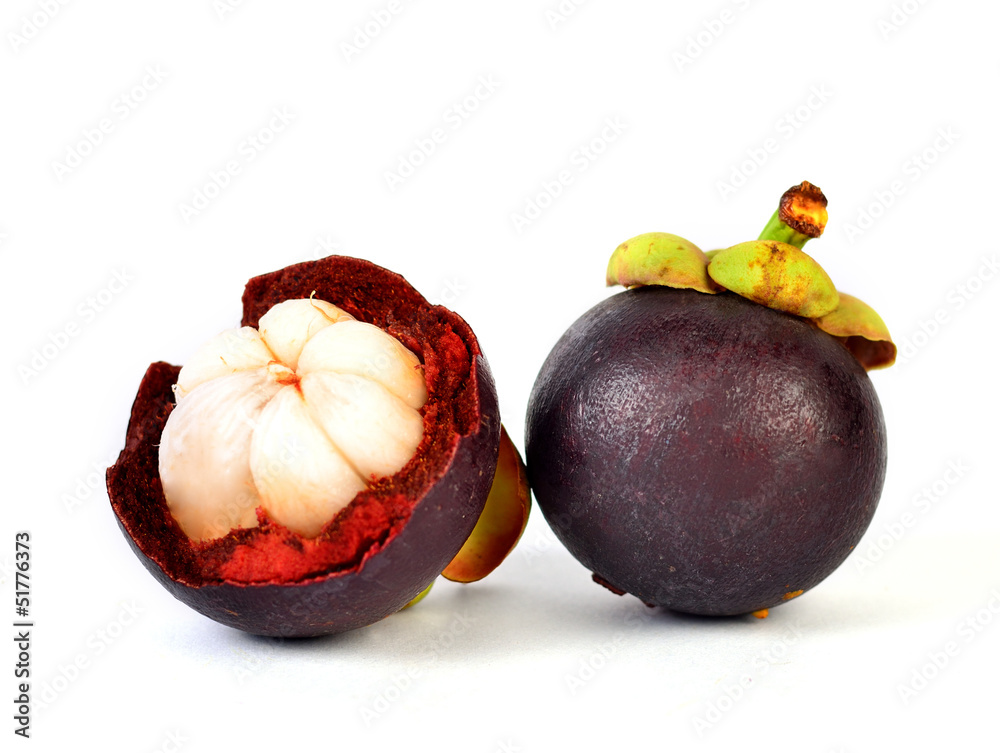 Mangosteen fruit and cross section showing the thick purple skin ...