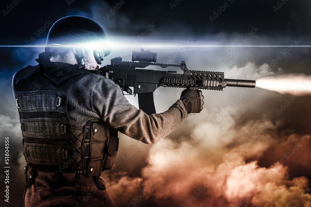 assault soldier with rifle on apocalyptic clouds, firing Stock Photo ...