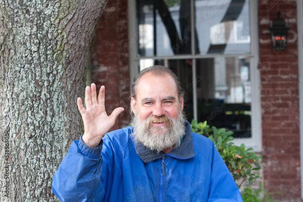 Homeless man waving Stock Photo | Adobe Stock