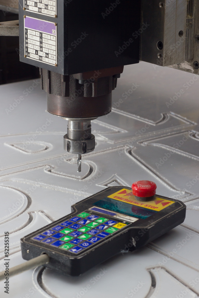 engraving machine for material processing with a remote control Stock ...