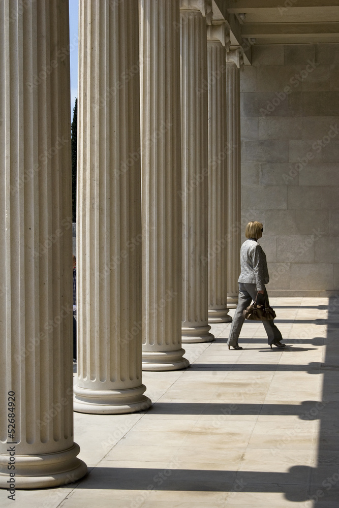 Women behind columns of entrance to gallery in Split; Croatia Stock ...