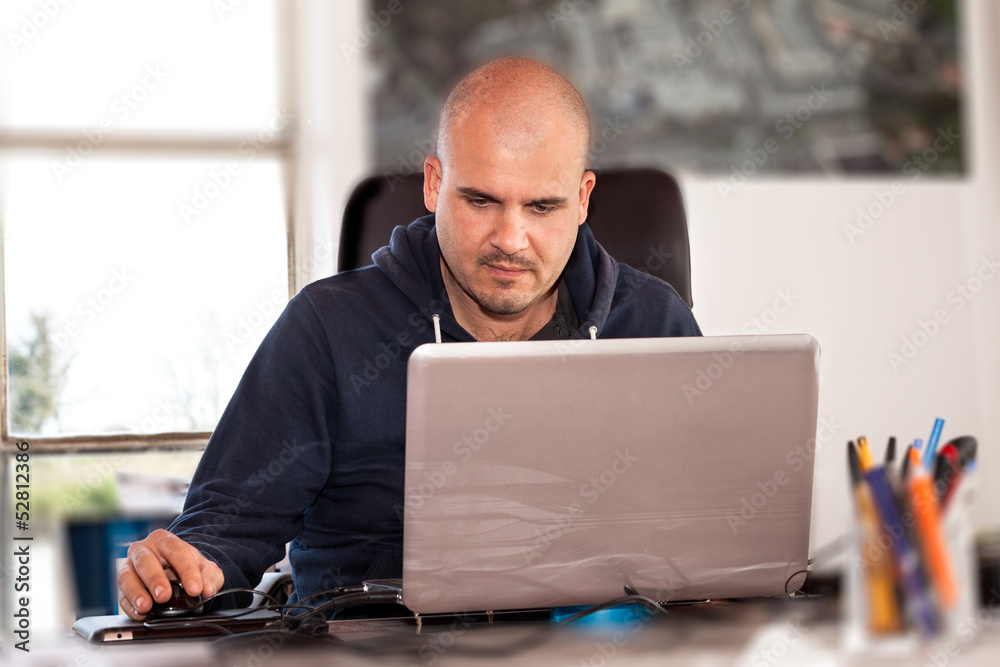 Man Using Laptop Stock Photo | Adobe Stock