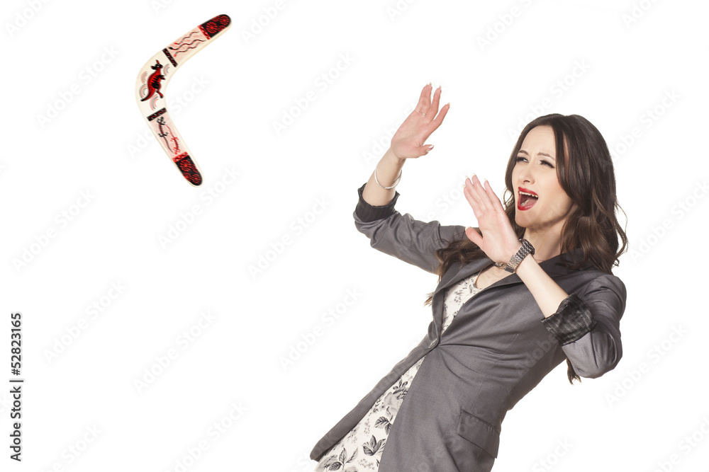 woman defending herself with her hands from the boomerang Stock Photo ...