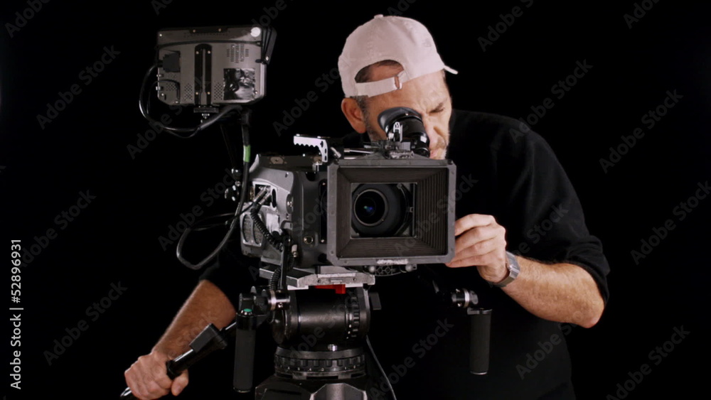 cameraman working with a cinema camera Stock Video | Adobe Stock