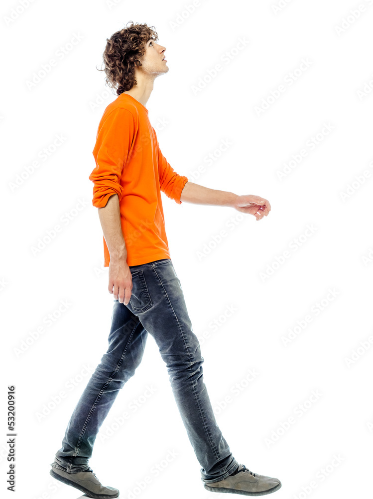 young man walking looking up side view Stock Photo | Adobe Stock