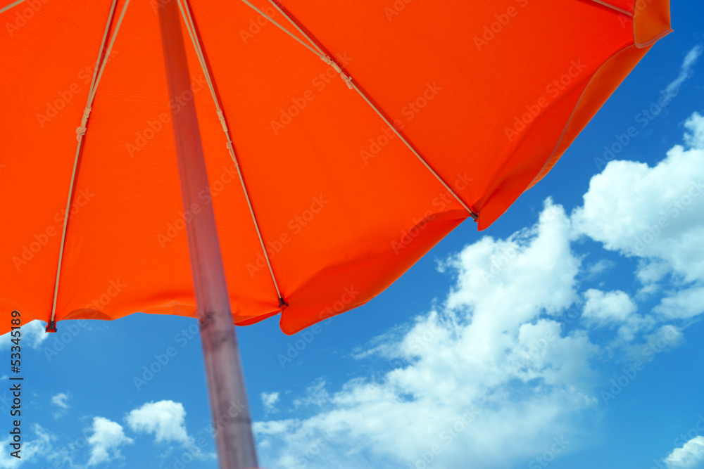 Parasol and beautiful sky with clouds Stock Photo | Adobe Stock