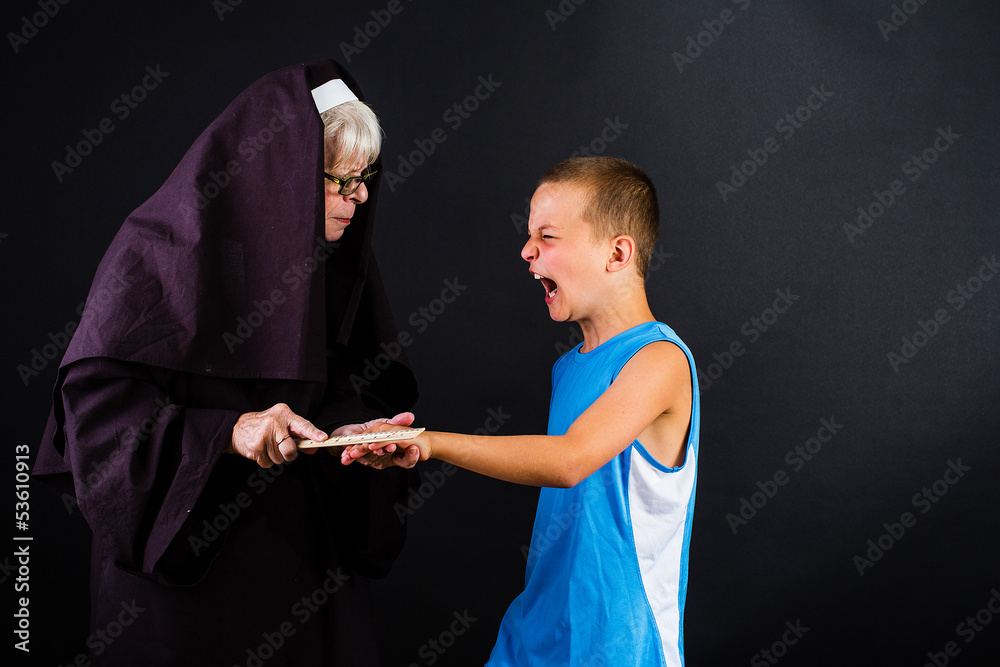 Nun punishing young boy Stock Photo | Adobe Stock