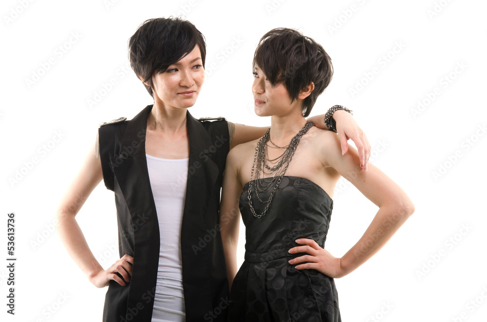 korean sisters in alternative k pop wear with isolated white bac Stock ...