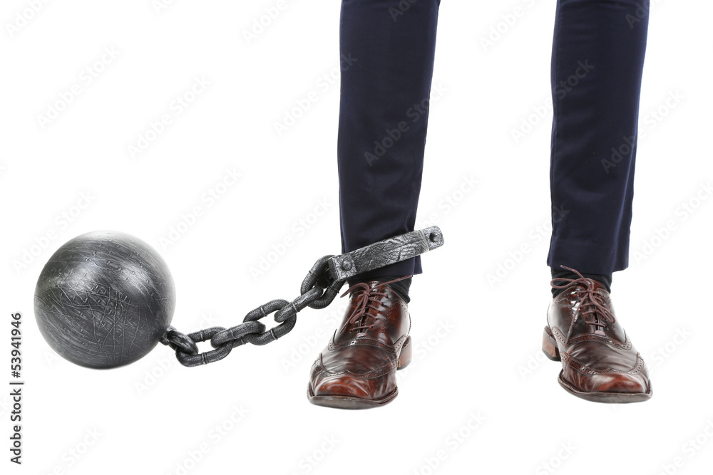 Business worker with ball and chain attached to foot isolated Stock ...