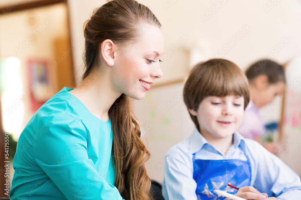 teacher and student in the classroom Stock Photo | Adobe Stock