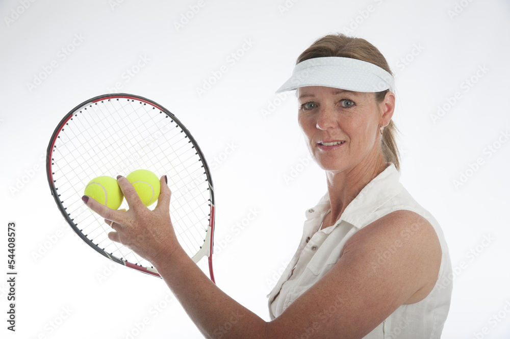 Female tennis player holding racquet Stock Photo | Adobe Stock