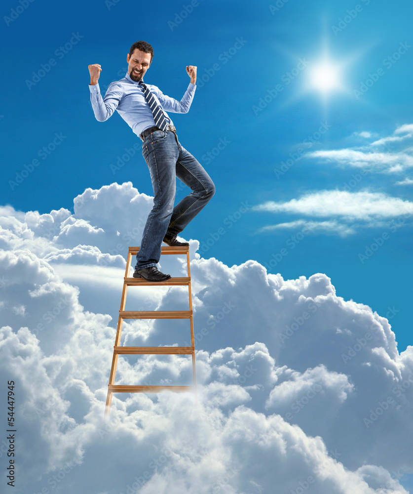 businessman standing at the top of ladder high in the sky Stock Photo ...