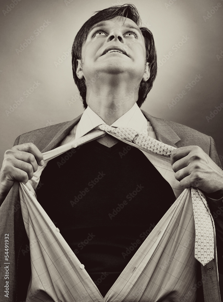 Business man tearing off his shirt Stock Photo | Adobe Stock