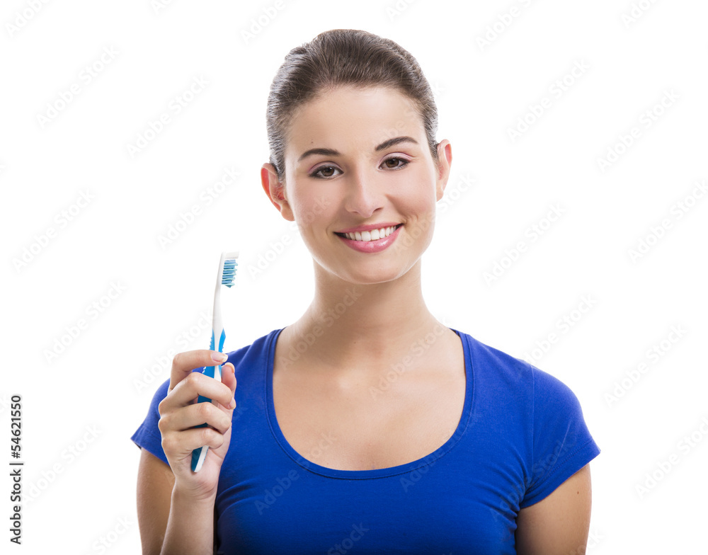 Beautiful woman with a toothbrush Stock Photo | Adobe Stock