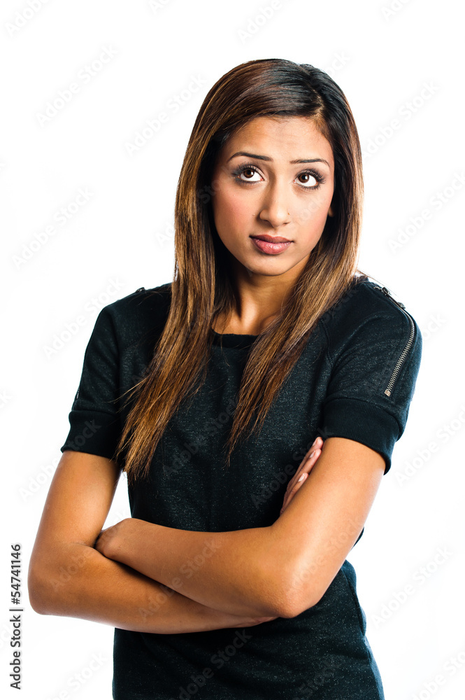 Beautiful young Indian model posing in a studio Stock Photo | Adobe Stock