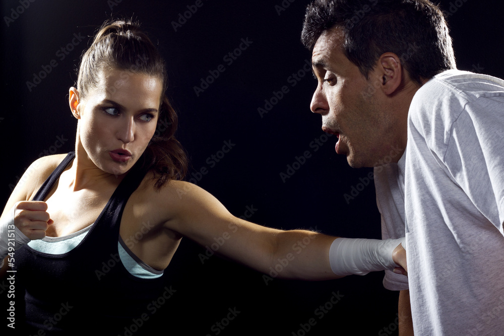 young fit woman fighting a man Stock Photo | Adobe Stock