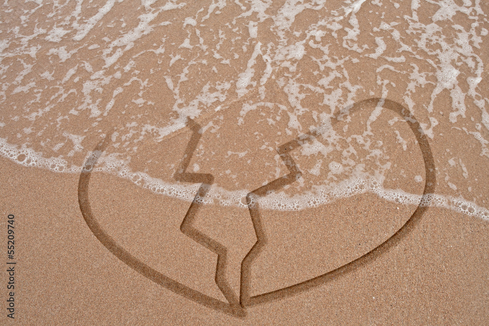 Broken heart on sand and wave Stock Photo | Adobe Stock