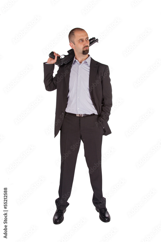 Mafia man is holding a shotgun Stock Photo | Adobe Stock