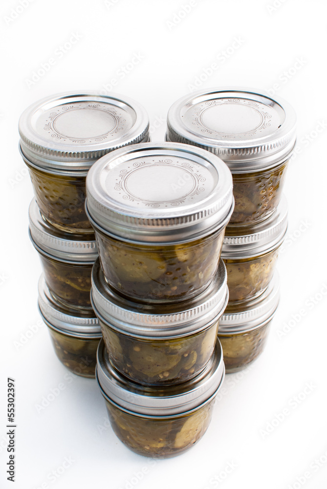Nine jars of pickles stacked on a white isolated background Stock Photo ...