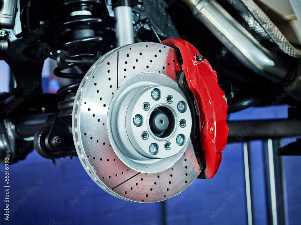 Brake of a car on a service lift Stock Photo | Adobe Stock
