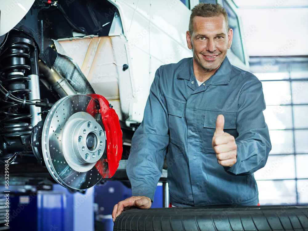 Master mechanic shows thumb up Stock-Foto | Adobe Stock