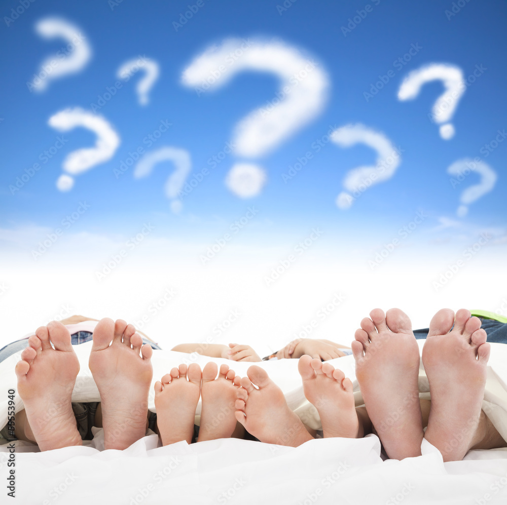 family sleeping on the bed with question mark concept Stock Photo ...