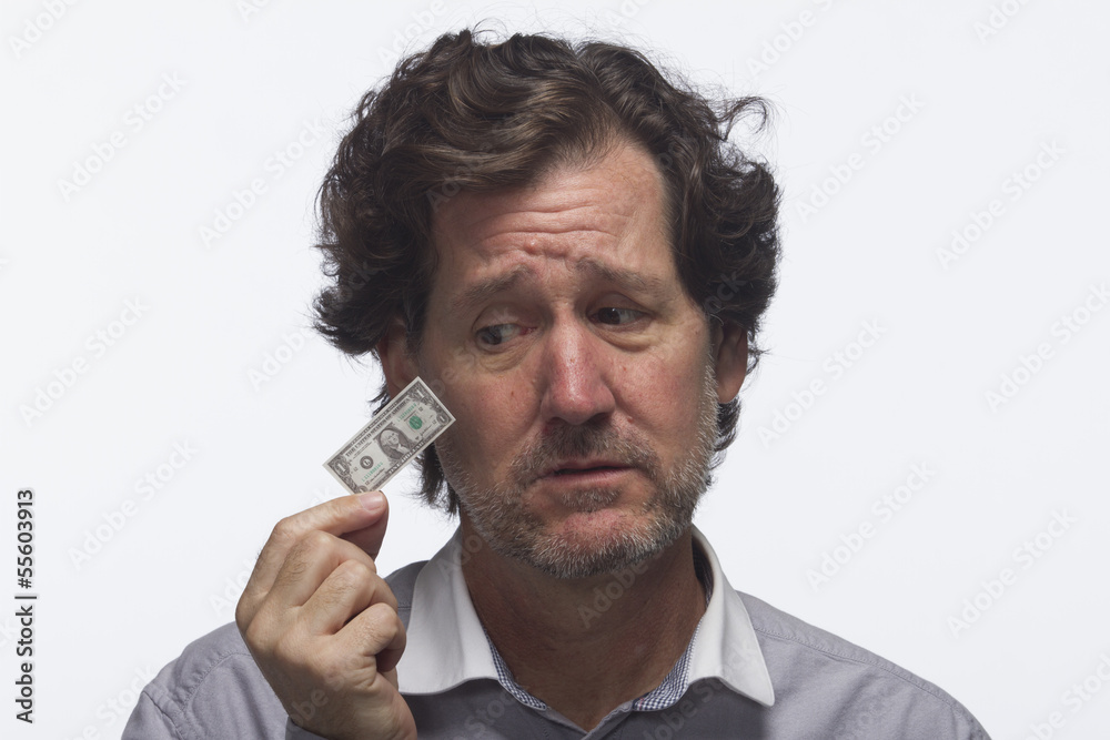 Sad man with dollar bill, horizontal Stock Photo | Adobe Stock