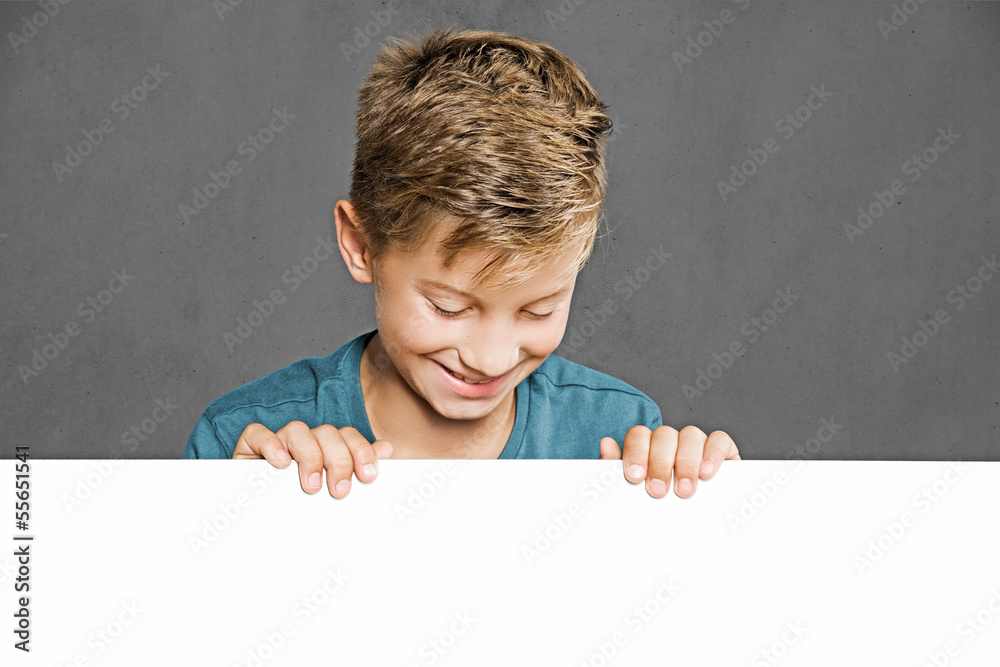 Child looking over white Wall Stock-Foto | Adobe Stock