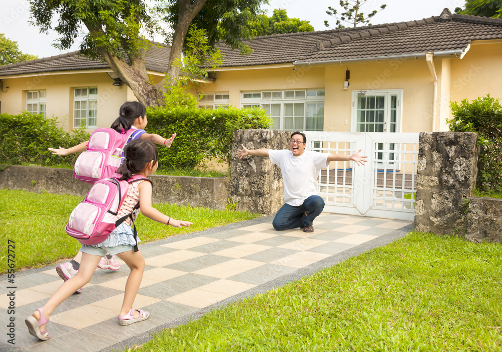 happy father with kids in front of house Stock Photo | Adobe Stock