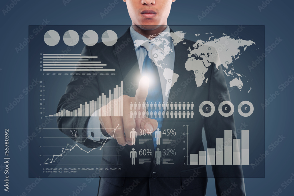 man pushing on a touch screen of infographics Stock Photo | Adobe Stock