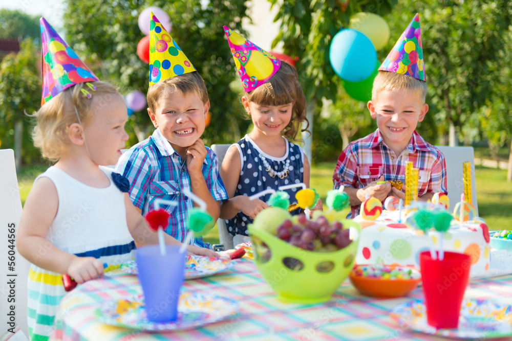 Group of kids having fun at birthday party Stock Photo | Adobe Stock