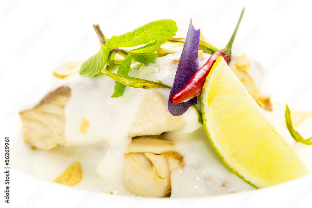 baked fish in cream sauce with lemon Stock Photo | Adobe Stock
