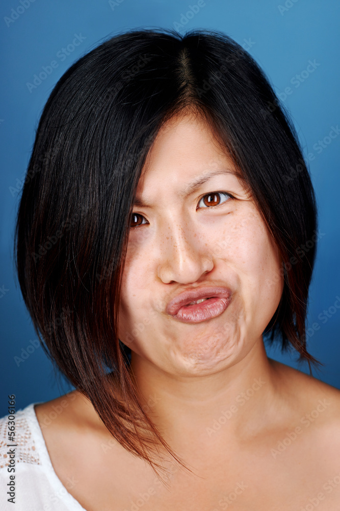 funny face chinese girl Stock Photo | Adobe Stock