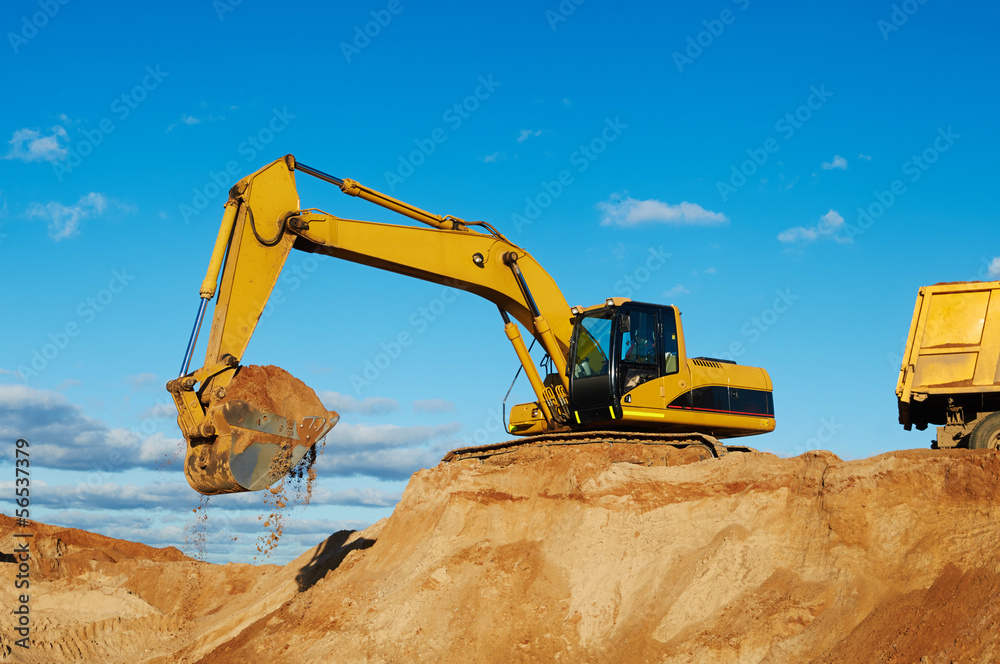 excavator loading tipper dumper Stock Photo | Adobe Stock