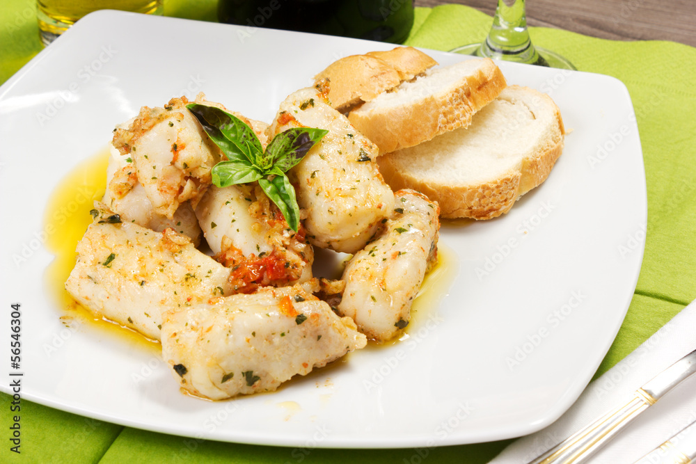 nasello in padella Stock Photo | Adobe Stock