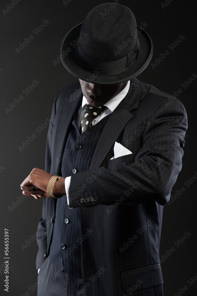 Foto de Retro african american gangster wearing striped suit and tie ...