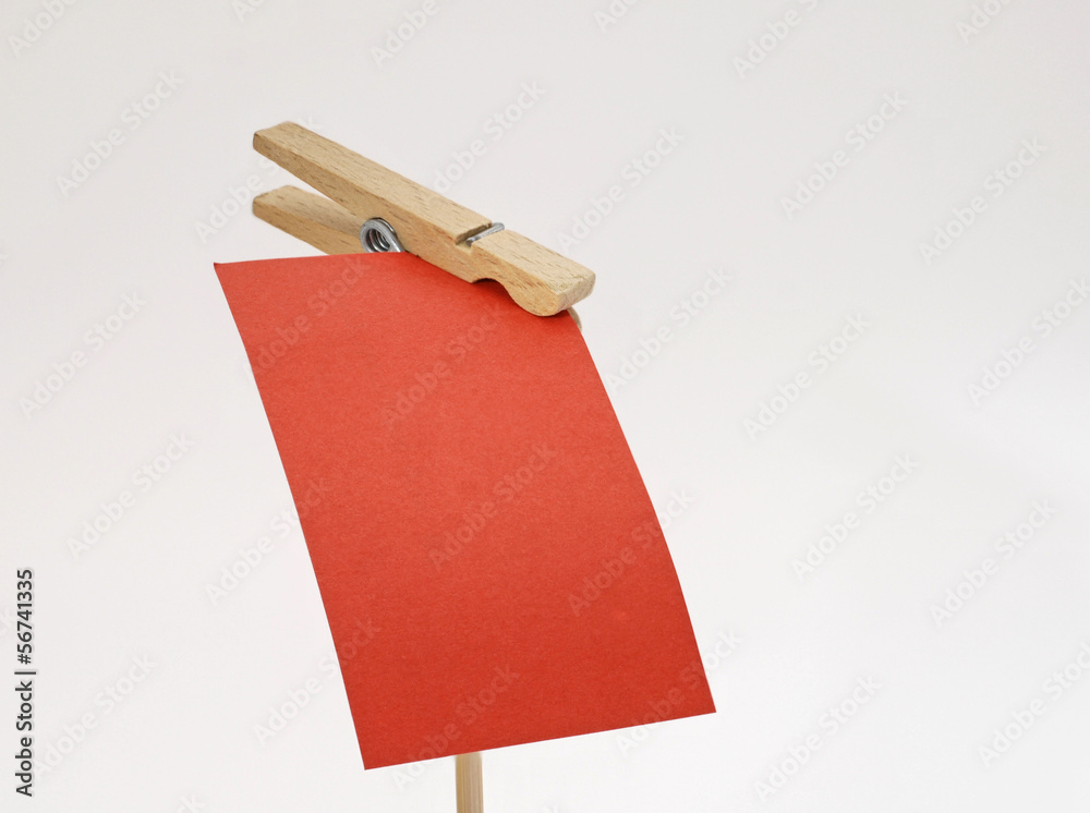 roter Zettel an Klammer Stock Photo | Adobe Stock